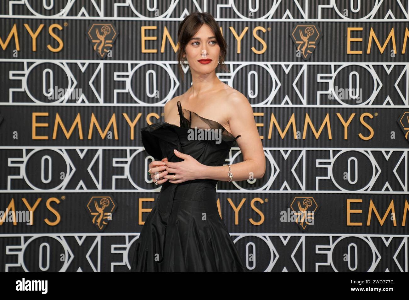 Lizzy Caplan arrives at the 75th Primetime Emmy Awards on Monday, Jan ...