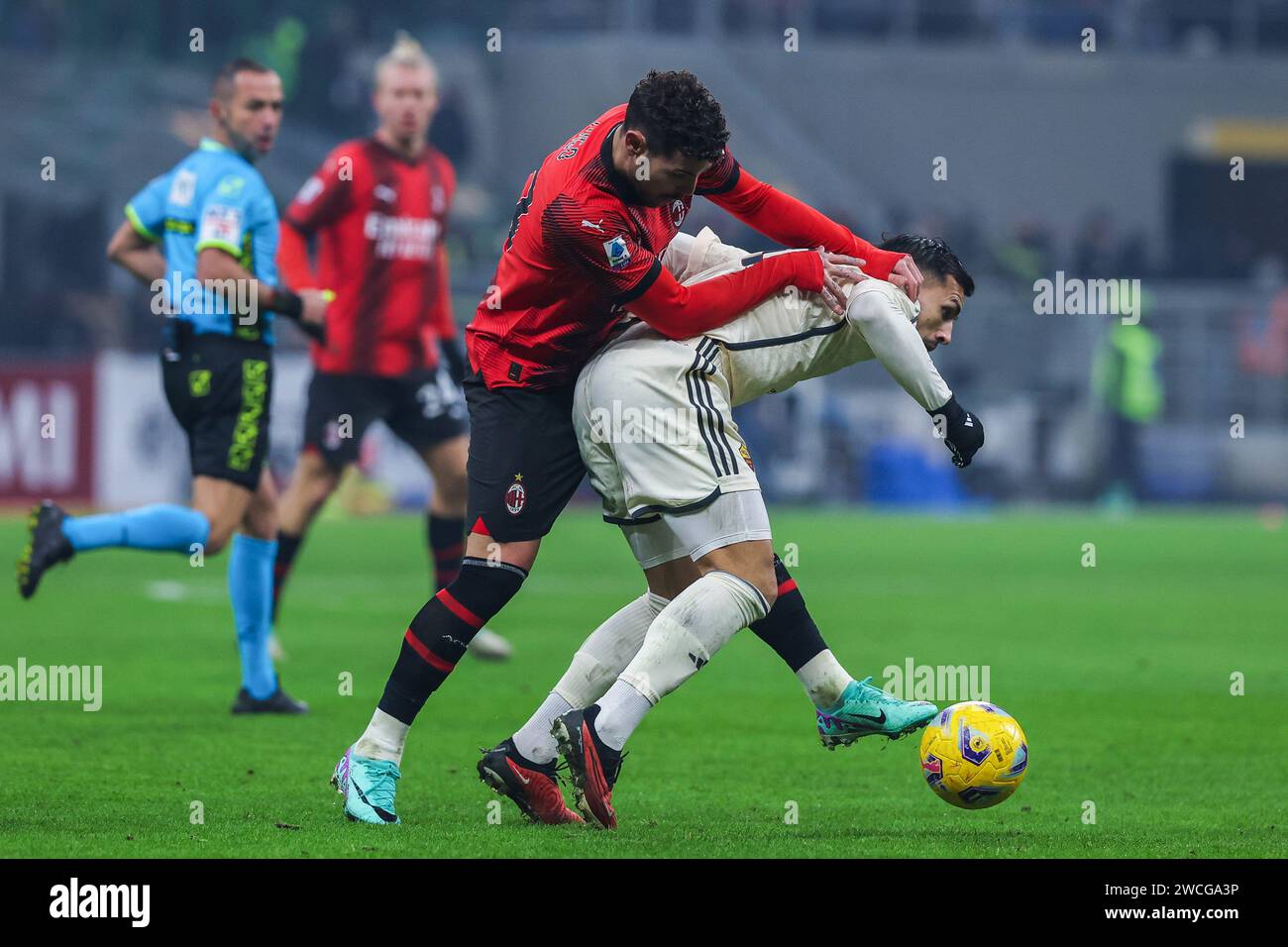 Milan, Italy. 14th Jan, 2024. Theo Hernandez of AC Milan (L) and ...