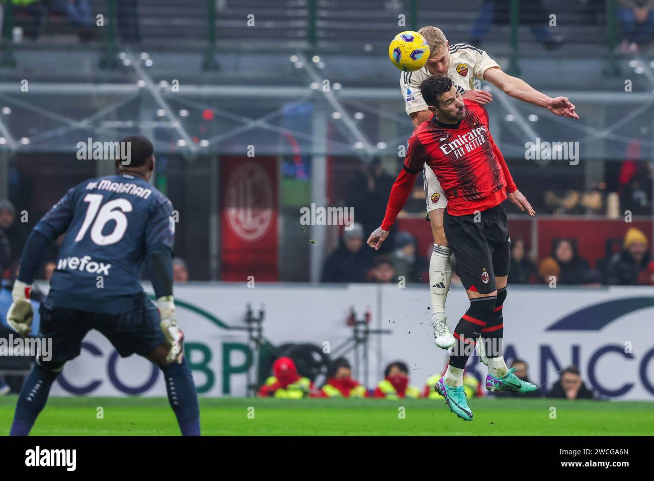 Milan, Italy. 14th Jan, 2024. Rasmus Kristensen of AS Roma (L) and Theo ...