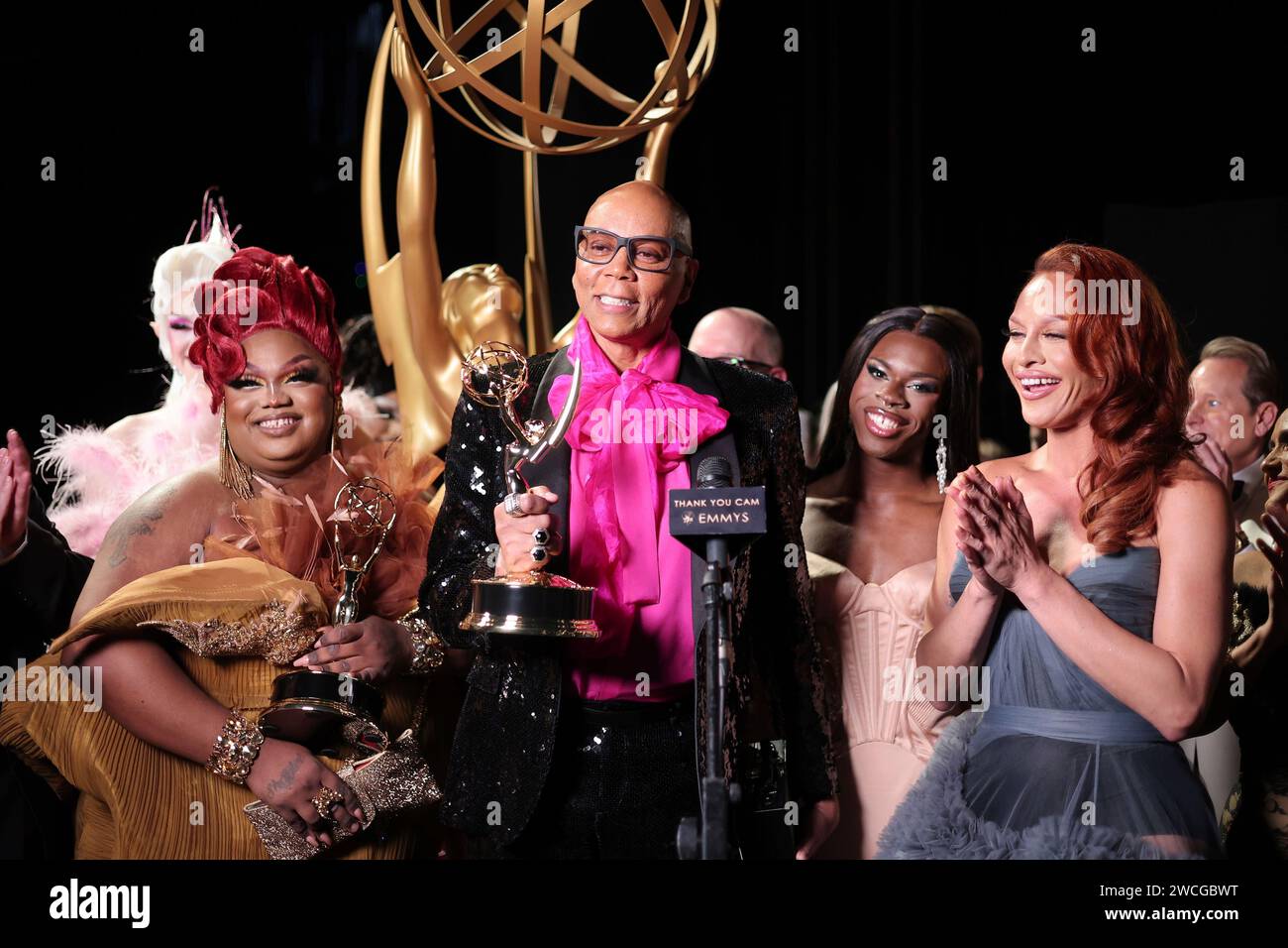 RuPaul Charles, center, winner for outstanding reality competition ...