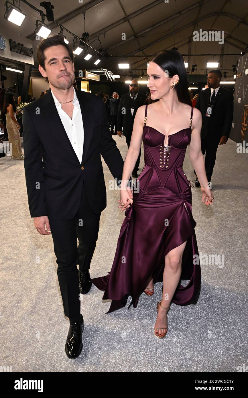 Jason Ralph, left. and Rachel Brosnahan walk the red carpet at the 75th ...