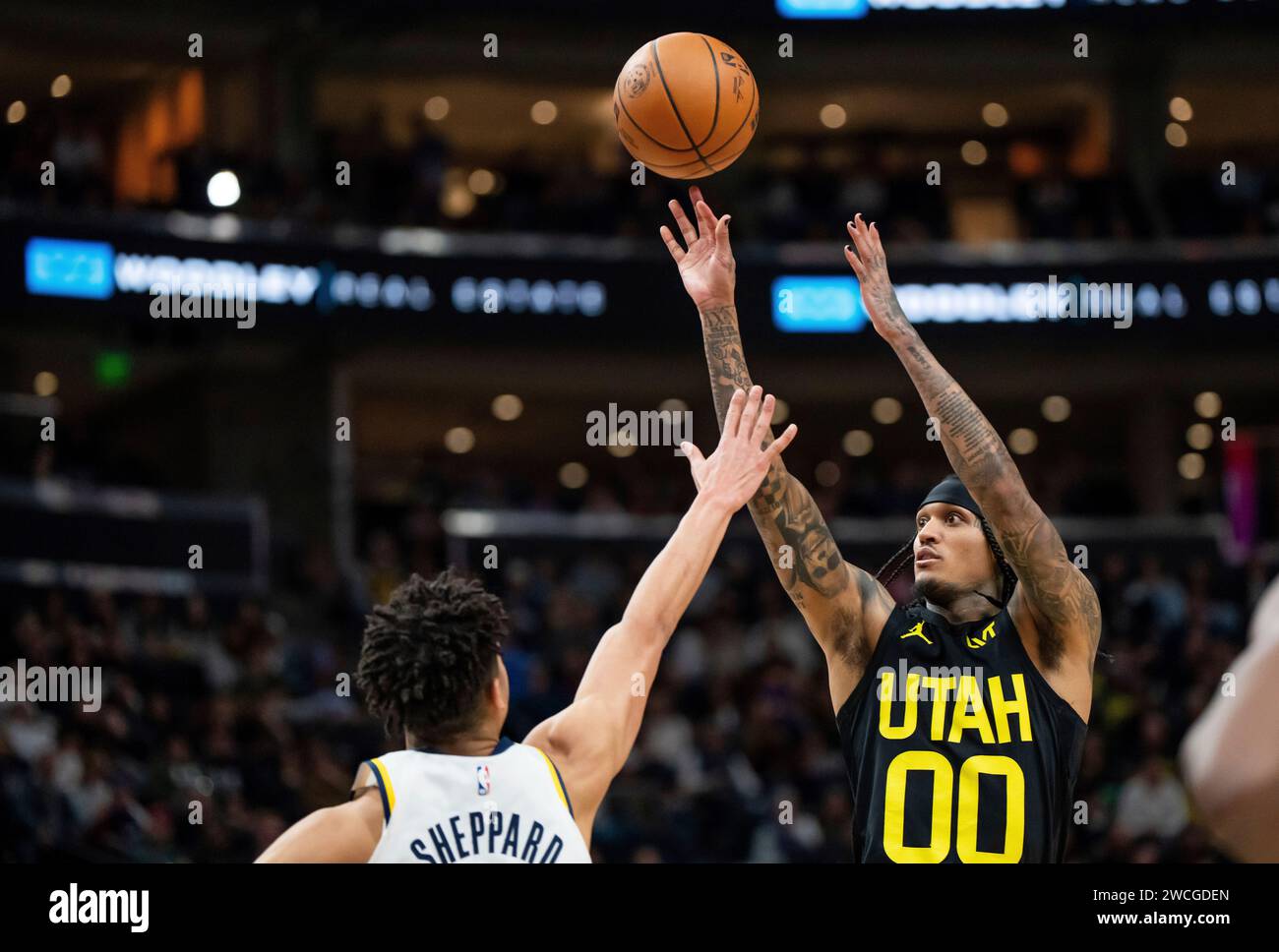 Utah Jazz guard Jordan Clarkson (00) shoots over Indiana Pacers guard ...