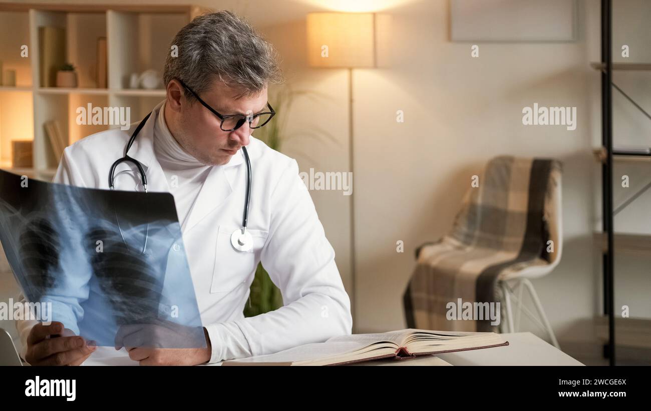 Radiology medicine lungs doctor man x ray book Stock Photo - Alamy