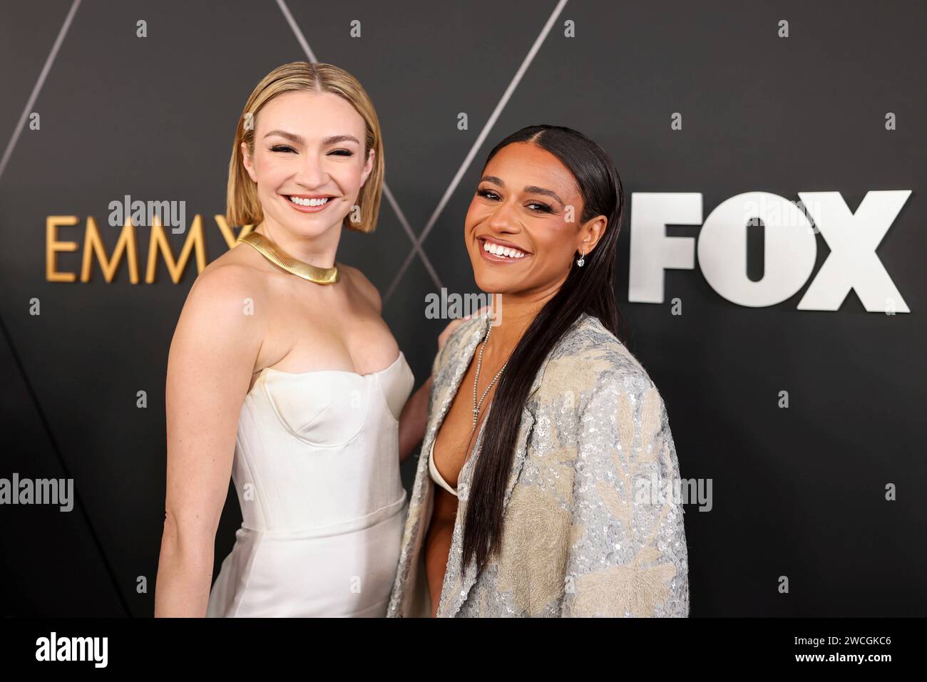 Ariana DeBose, right, walks the red carpet at the 75th Emmy Awards on ...