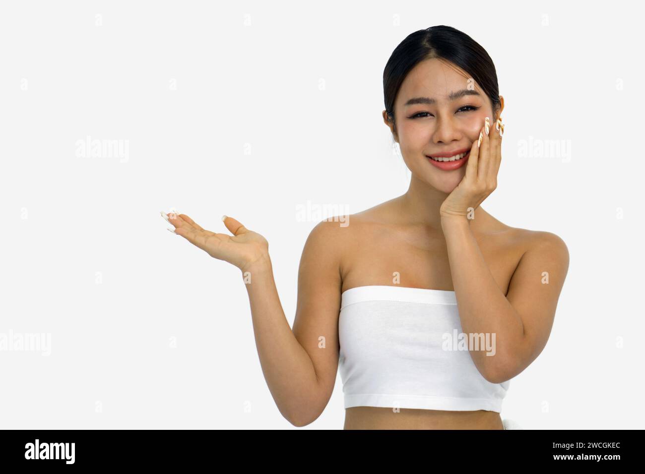 Beautiful young asian woman with clean fresh skin. Sweet smiling girl ...