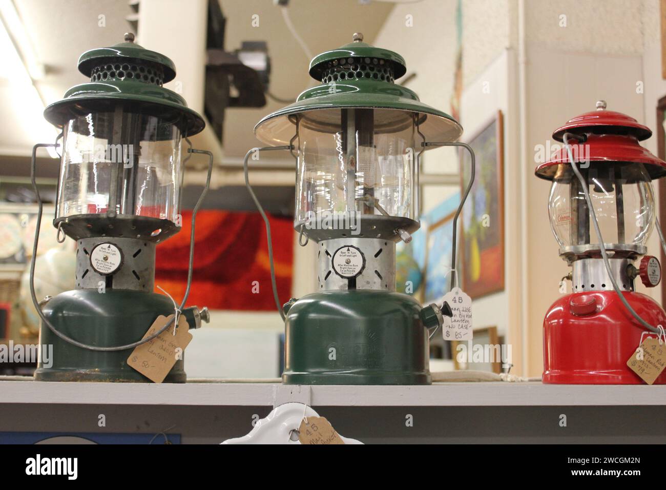 A collection of vintage lamps on a shelf Stock Photo - Alamy