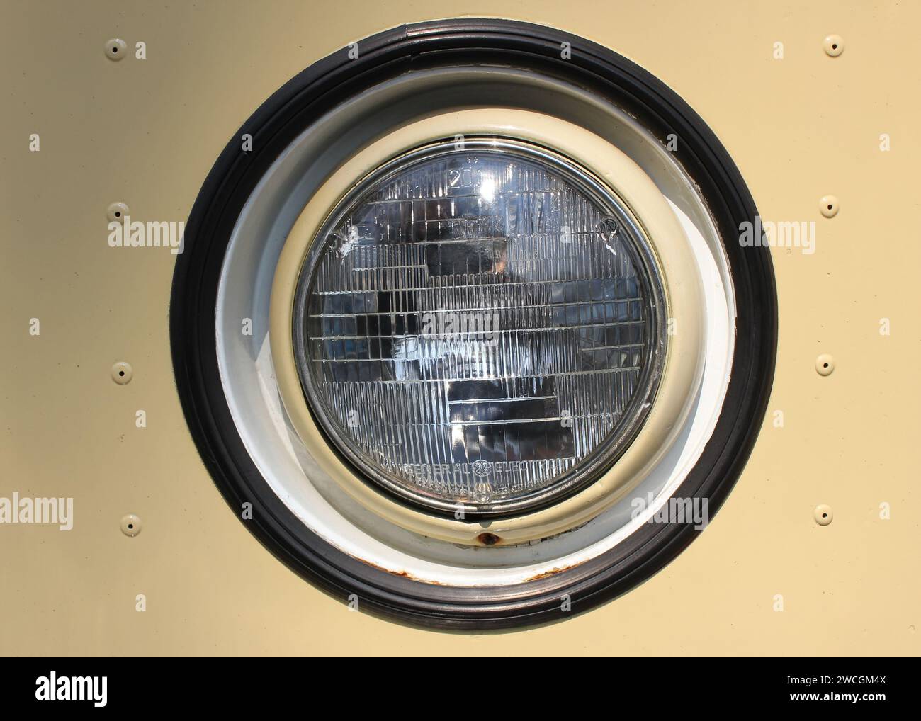 A close-up of a vehicle's headlight in a circular formation Stock Photo ...