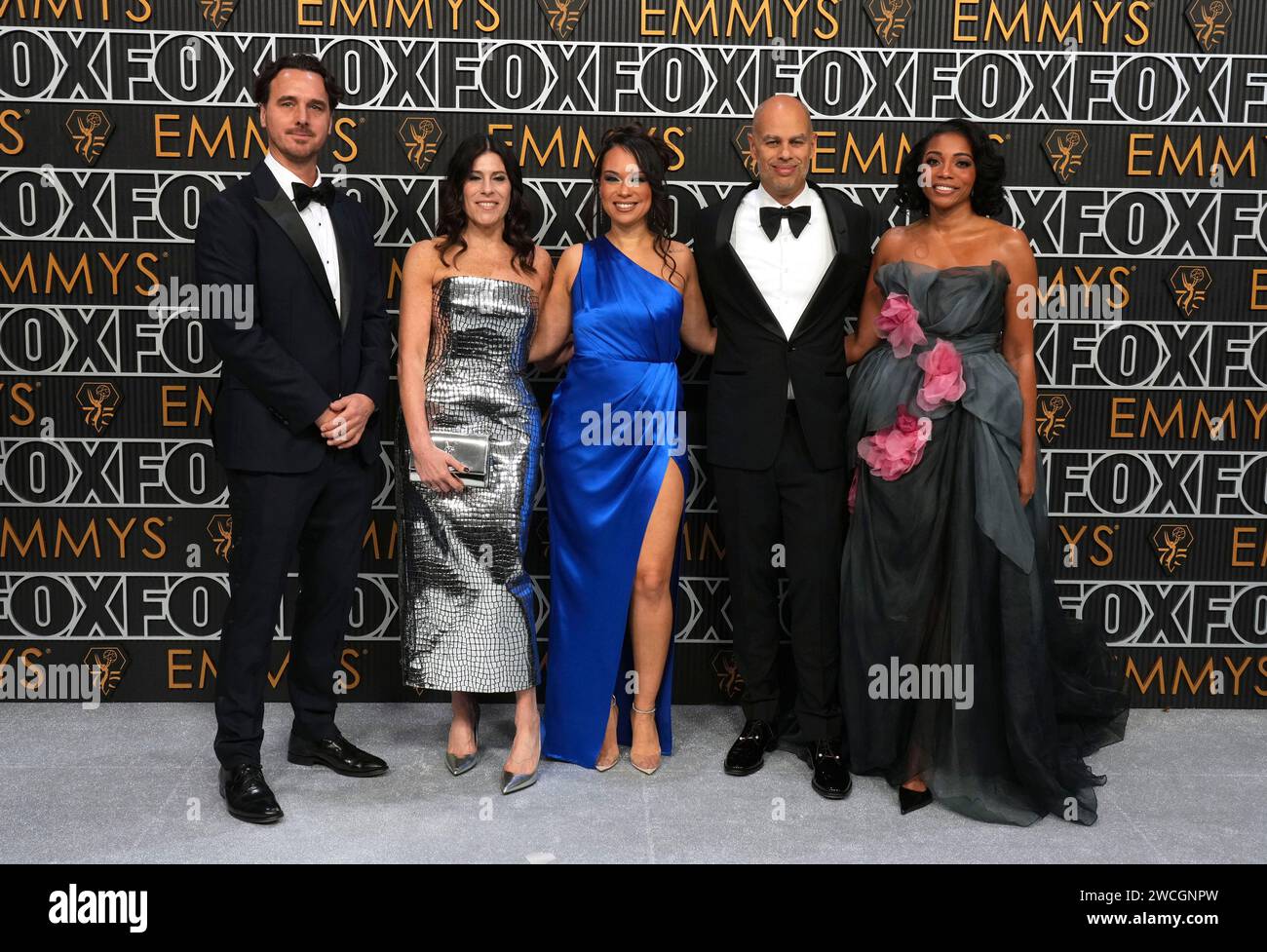 Jesse Collins, Rob Wade, Dionne Harmon and guests pose for a Red Carpet ...