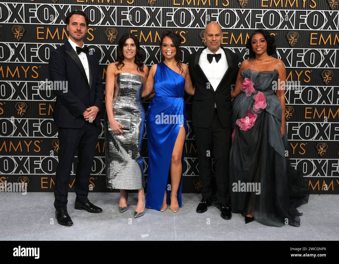 Jesse Collins, Rob Wade, Dionne Harmon and guests pose for a Red Carpet ...