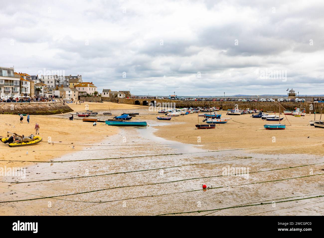 St Ives town in Cornwall, autumn 2023, low tide at harbour beach with ...