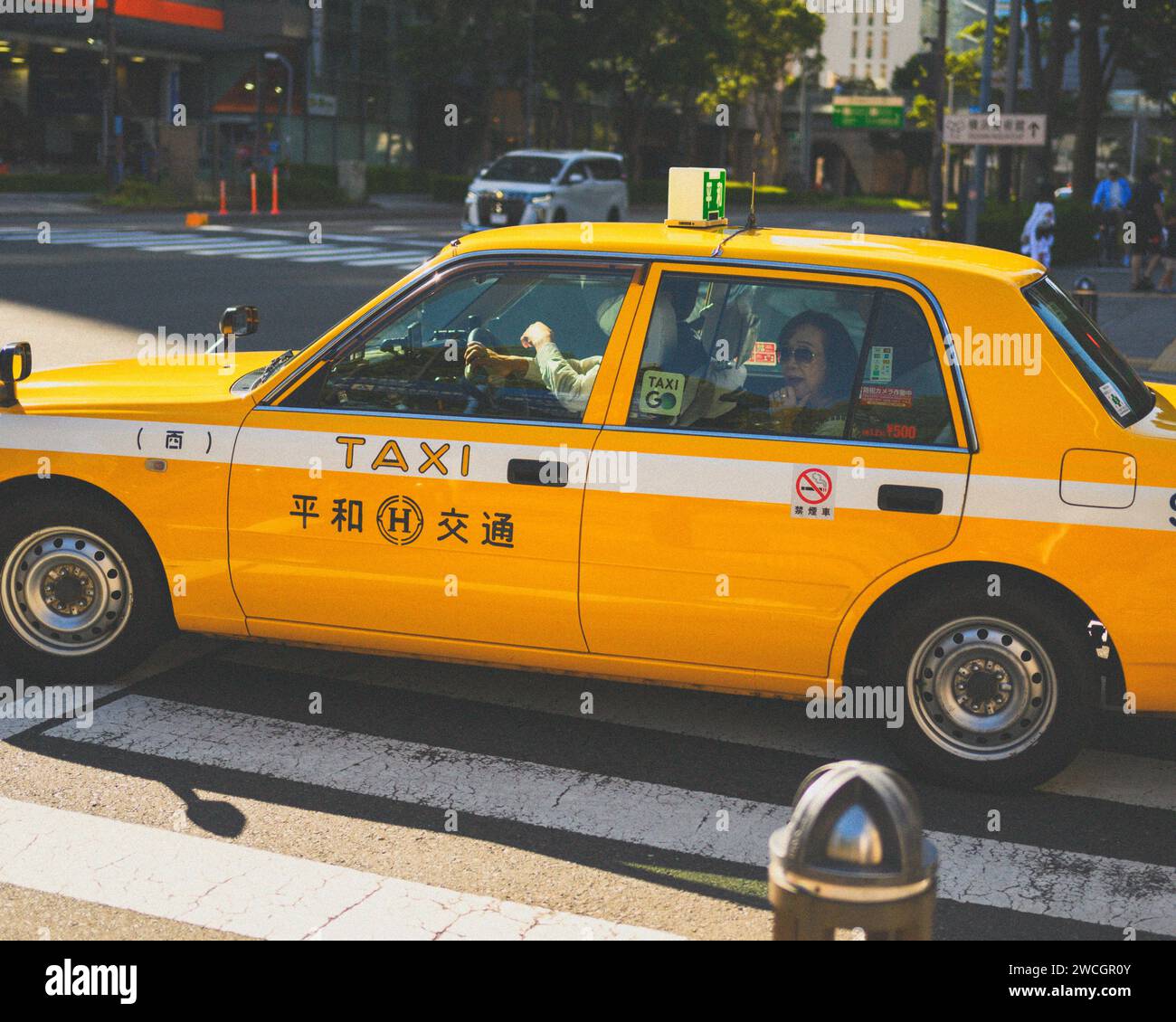 Yellow cab in Yokohama, Japan Stock Photo - Alamy