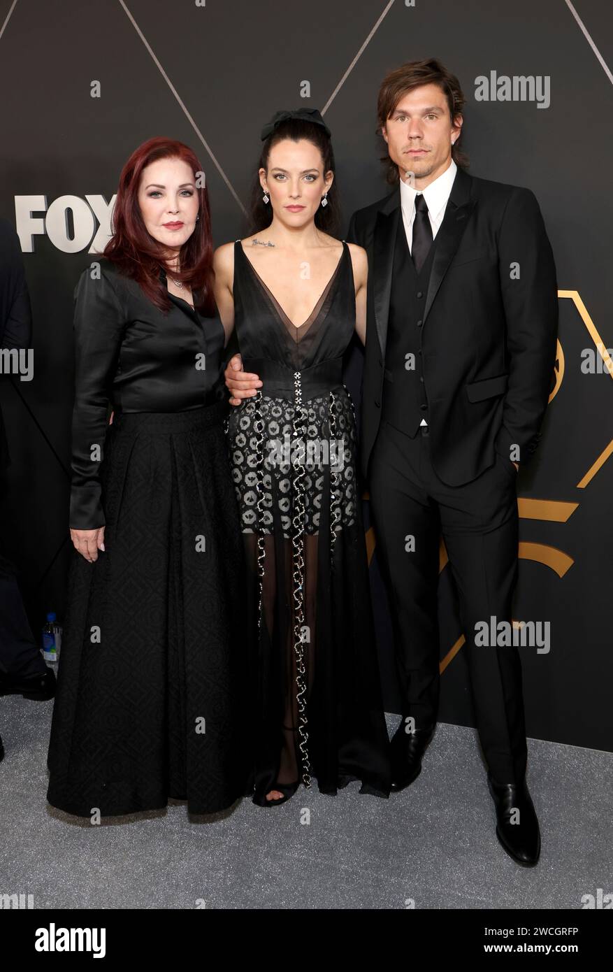 Riley Keough, left, and Priscilla Presley, middle, walks the red carpet ...