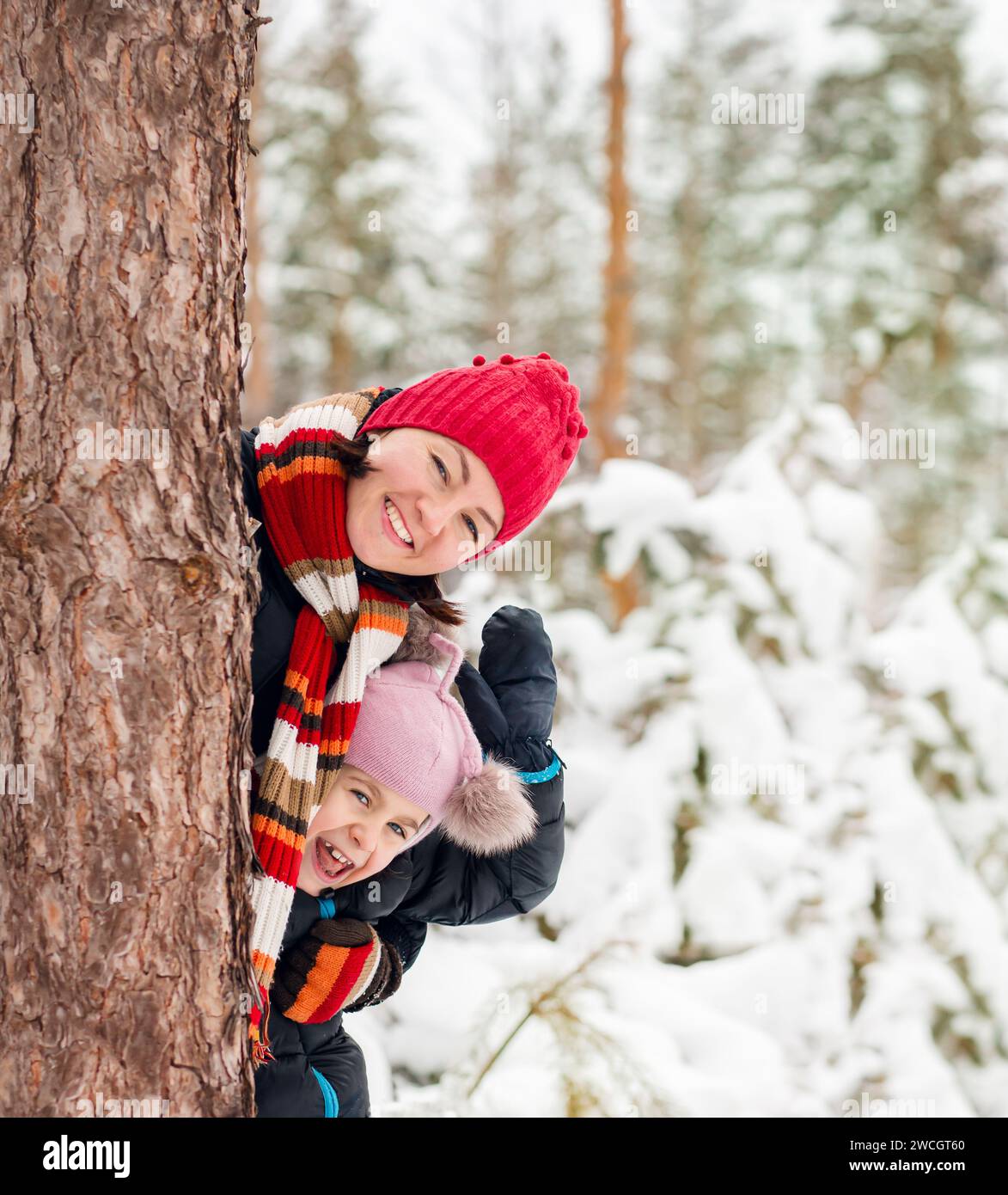 Open close-up portrait of cheerful and happy mother and daughter ...