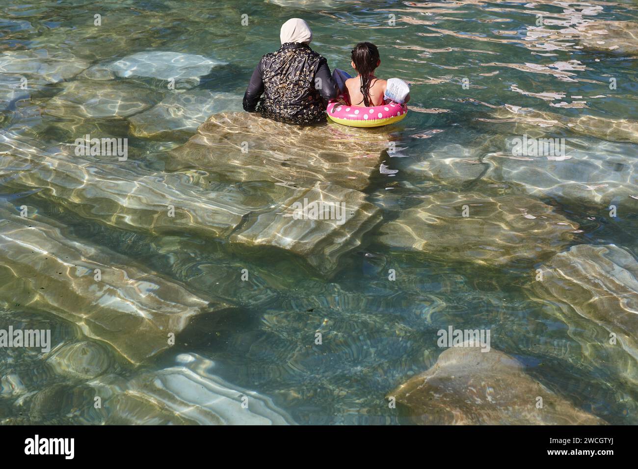 Thermal pool in archeological site of Hierapolis. Pamukkale landmark ...