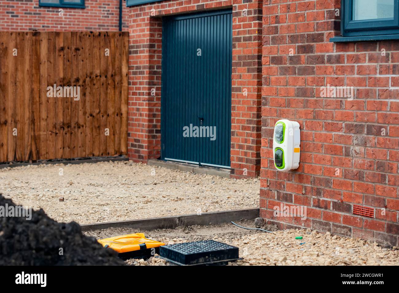 Electric vehicle domestic charging point installed outside of the house ...
