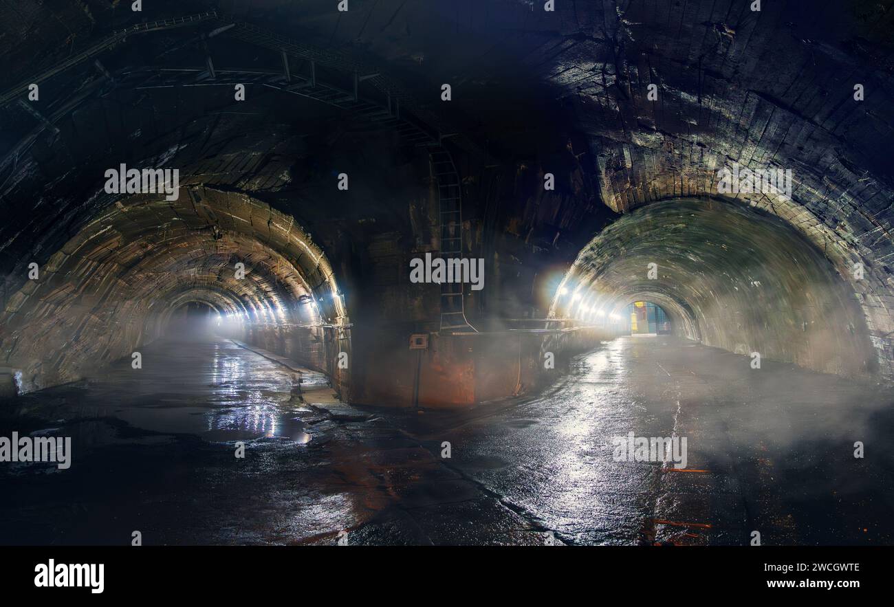 Underground tunnel splits into two paths, choice concept Stock Photo ...