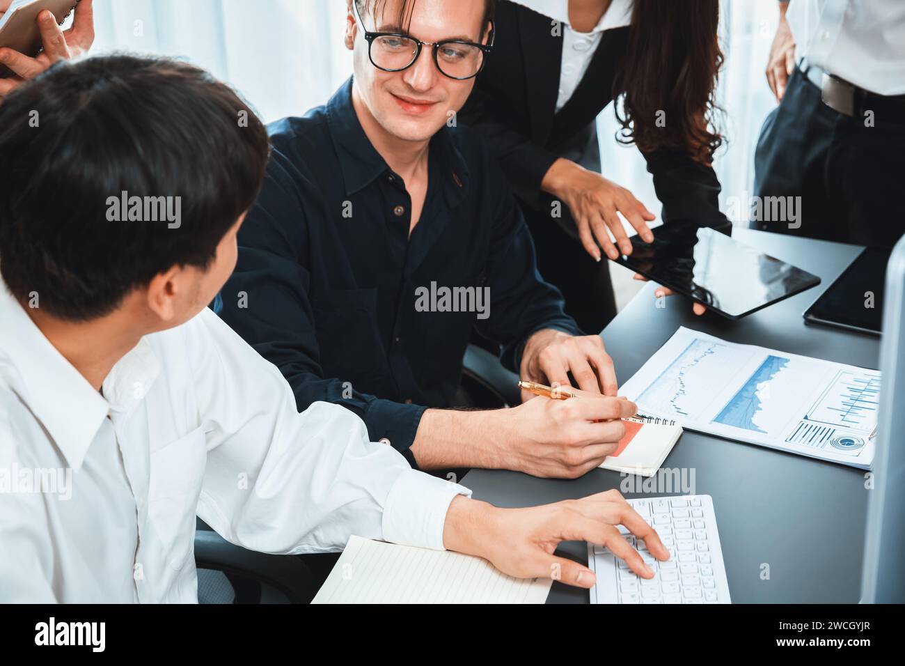 Data analysts team of office worker collaborate on business ...