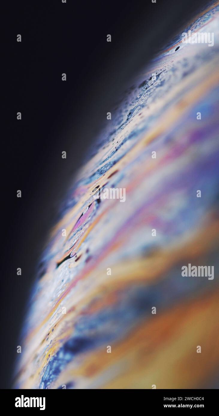 Paint splash holographic fluid color ink mix flow Stock Photo - Alamy