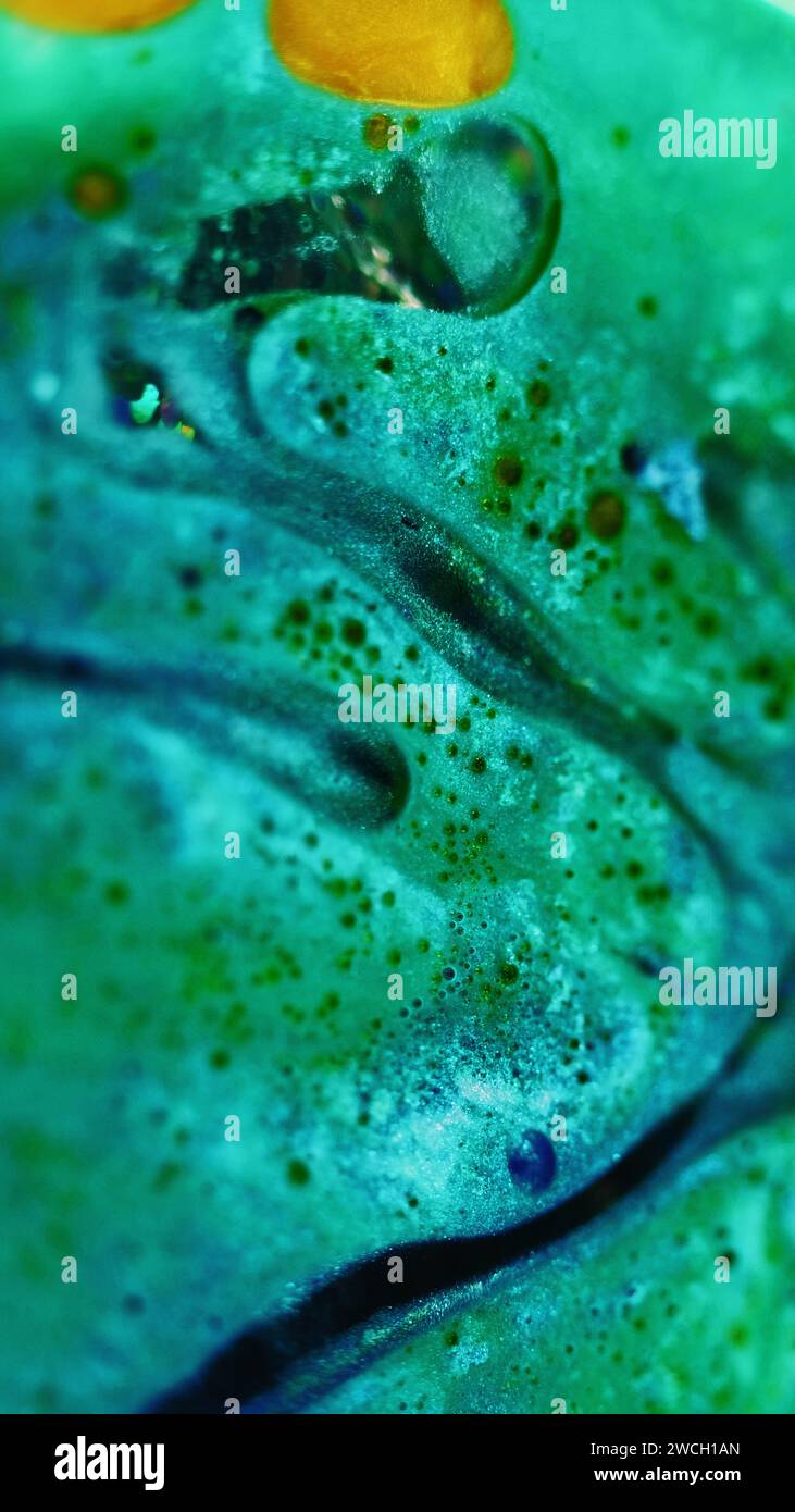 Bubble fluid foam texture glitter oil paint flow Stock Photo - Alamy