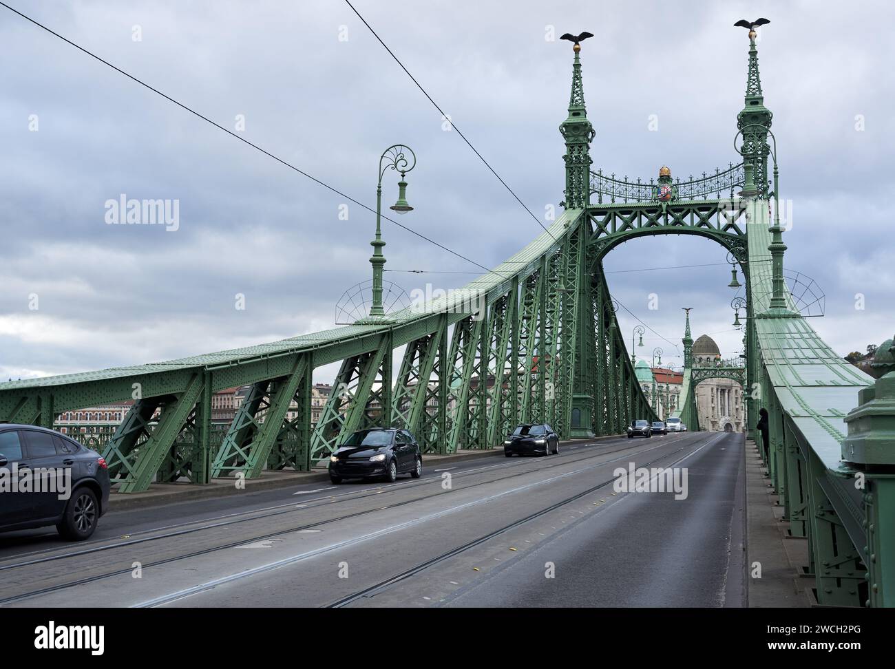 Iconic green iron bridge in Budapest, spanning the Danube River ...