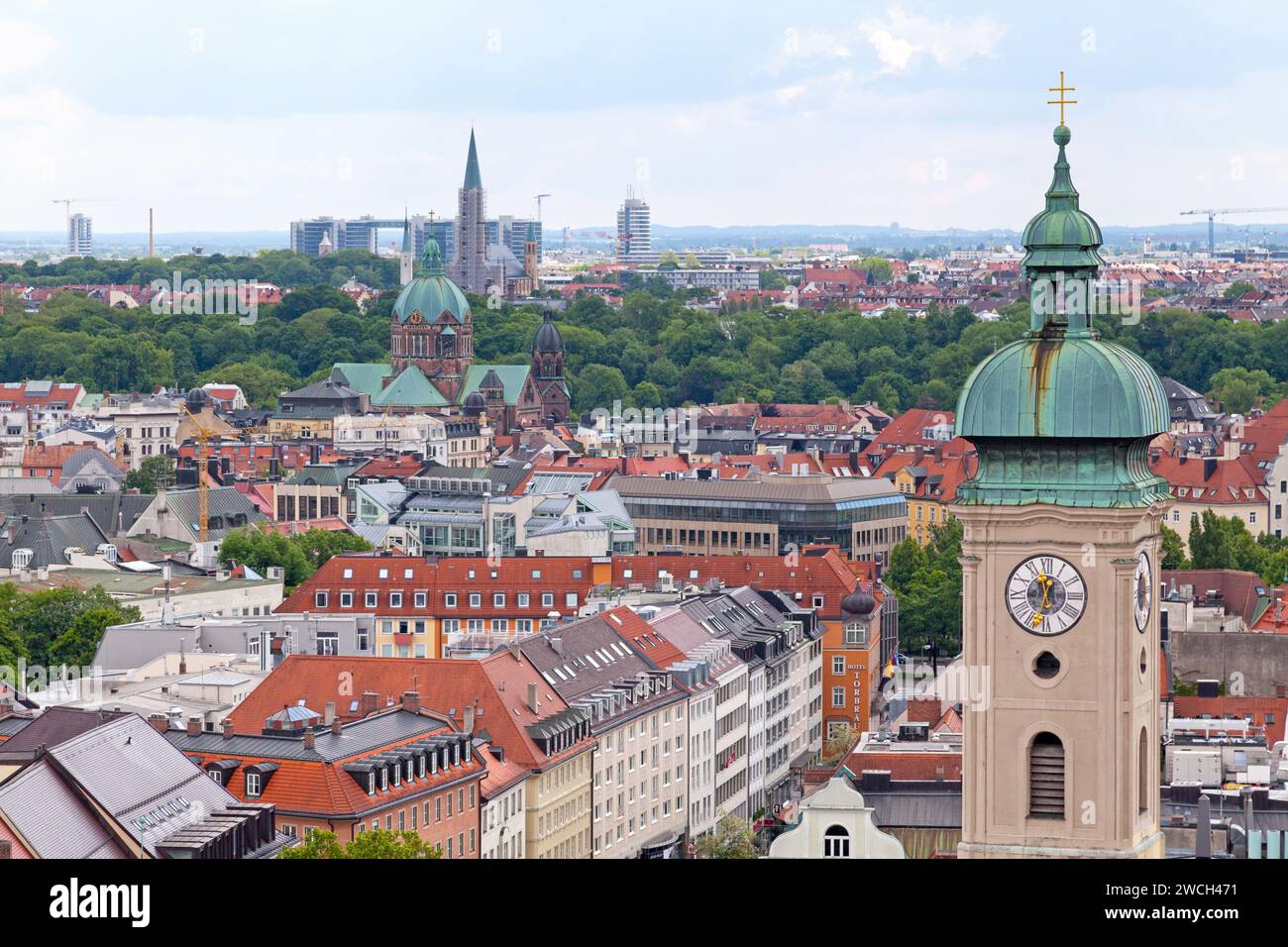 Munich, Germany - May 30 2019: Clock tower of the Heilig-Geist-Kirche ...