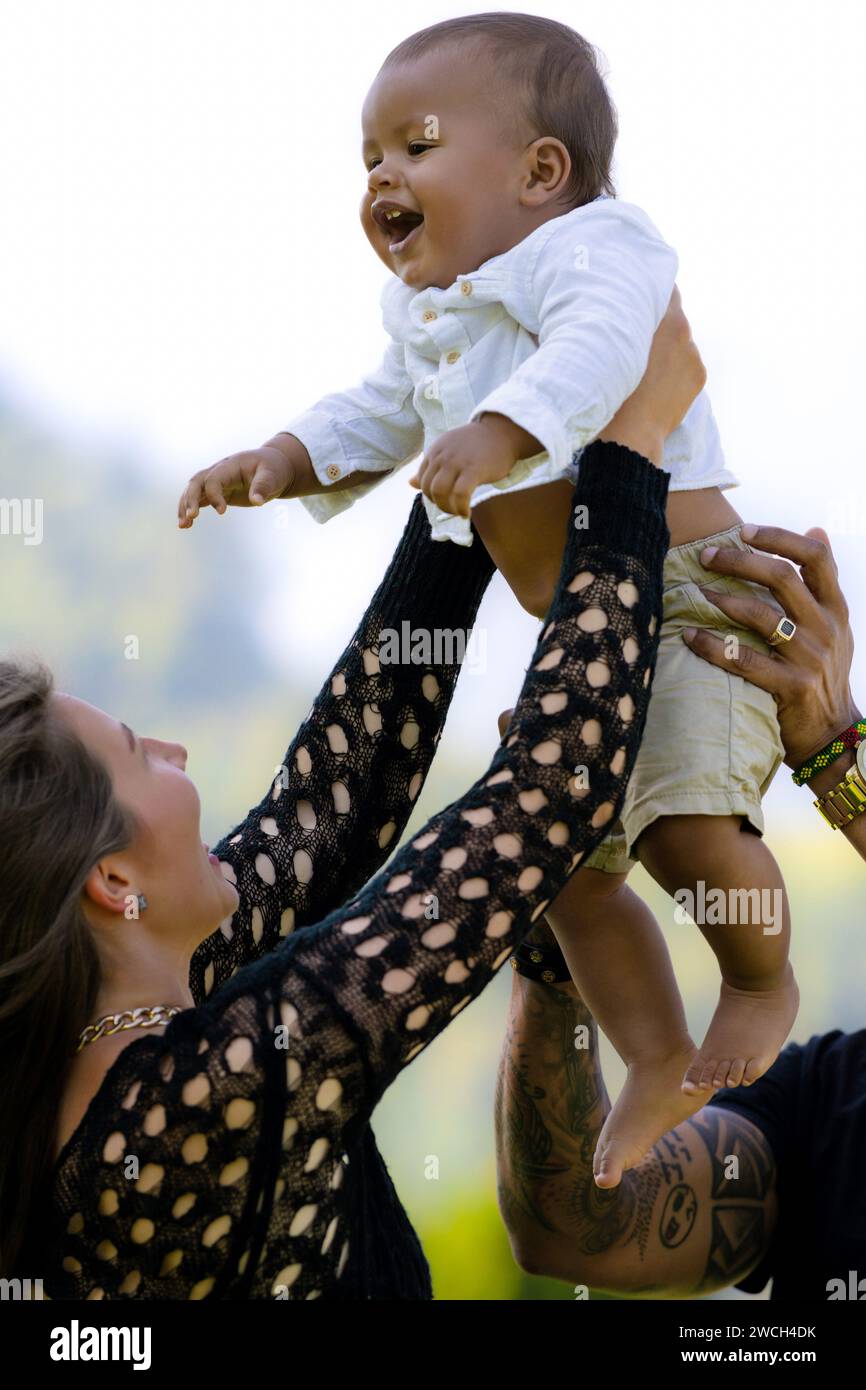 Multiethnic parents and amazed mixed race baby. Multiethnic family ...