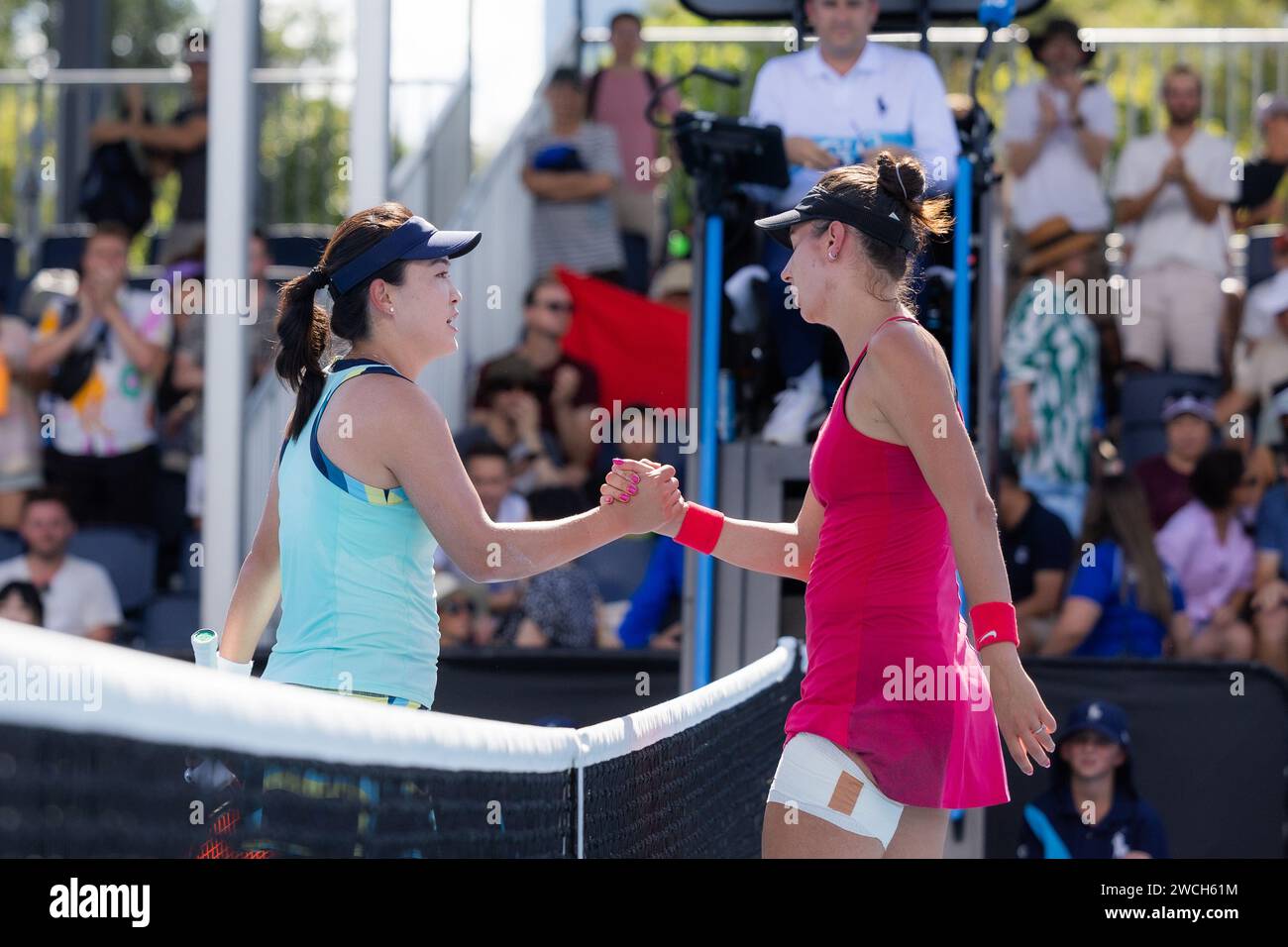 Melbourne, Australia. 16th Jan, 2024. Zhu Lin (L) of China and Dodin Oceane of France shake ...