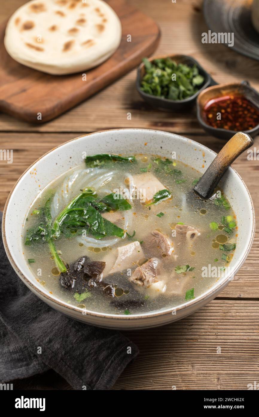 stewed mutton (lamb) with radish soup in casserole Stock Photo - Alamy