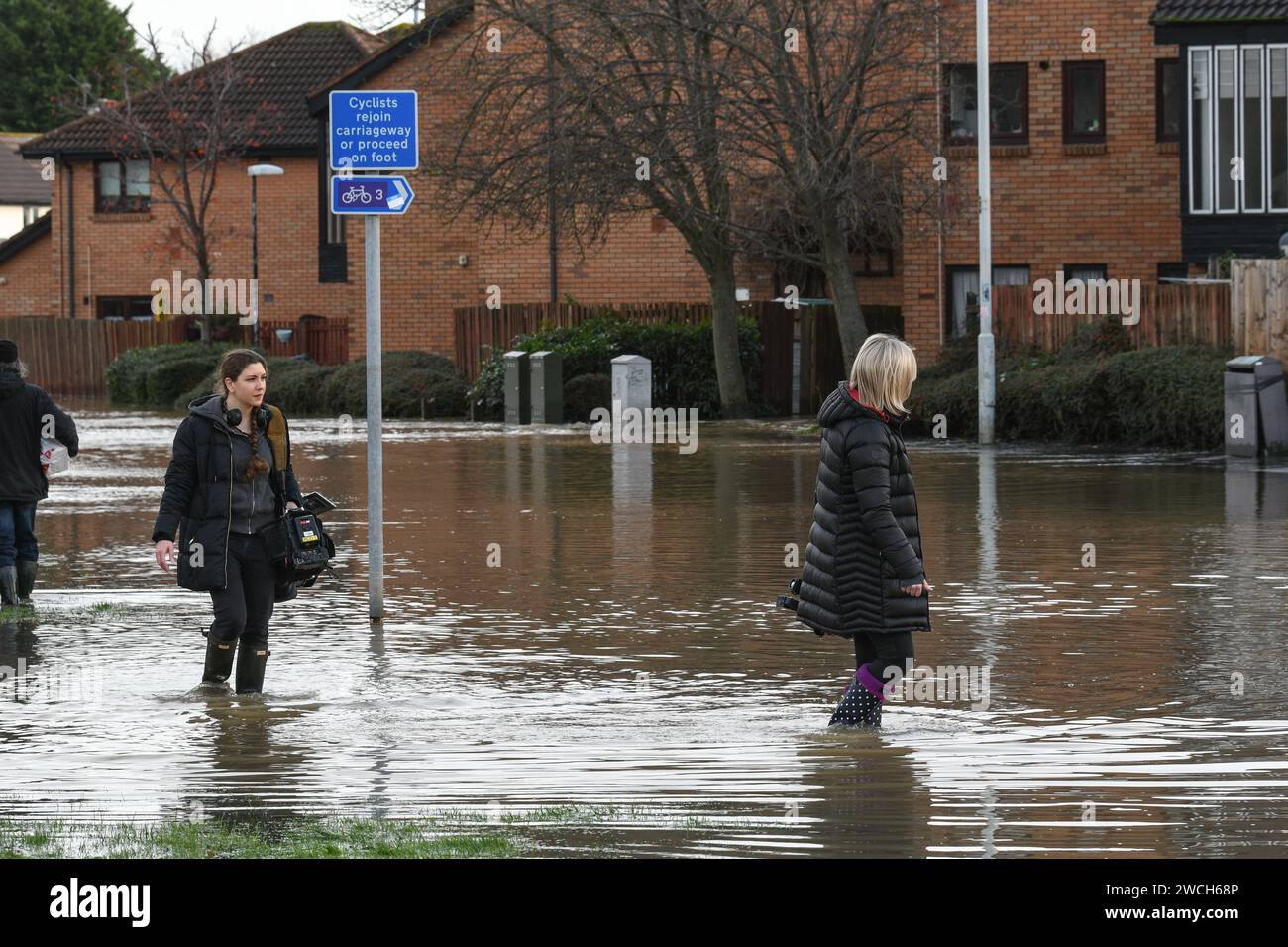 Walking through flood water hi-res stock photography and images - Alamy