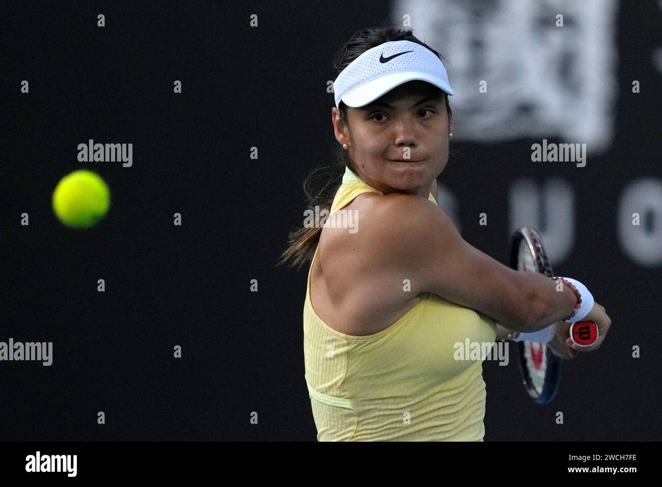 Emma Raducanu of Britain plays a backhand return to Shelby Rogers of ...