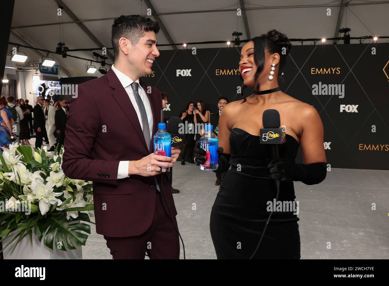 Patrick Gomez, left, and Janine Rubenstein arrive at the 75th Emmy ...