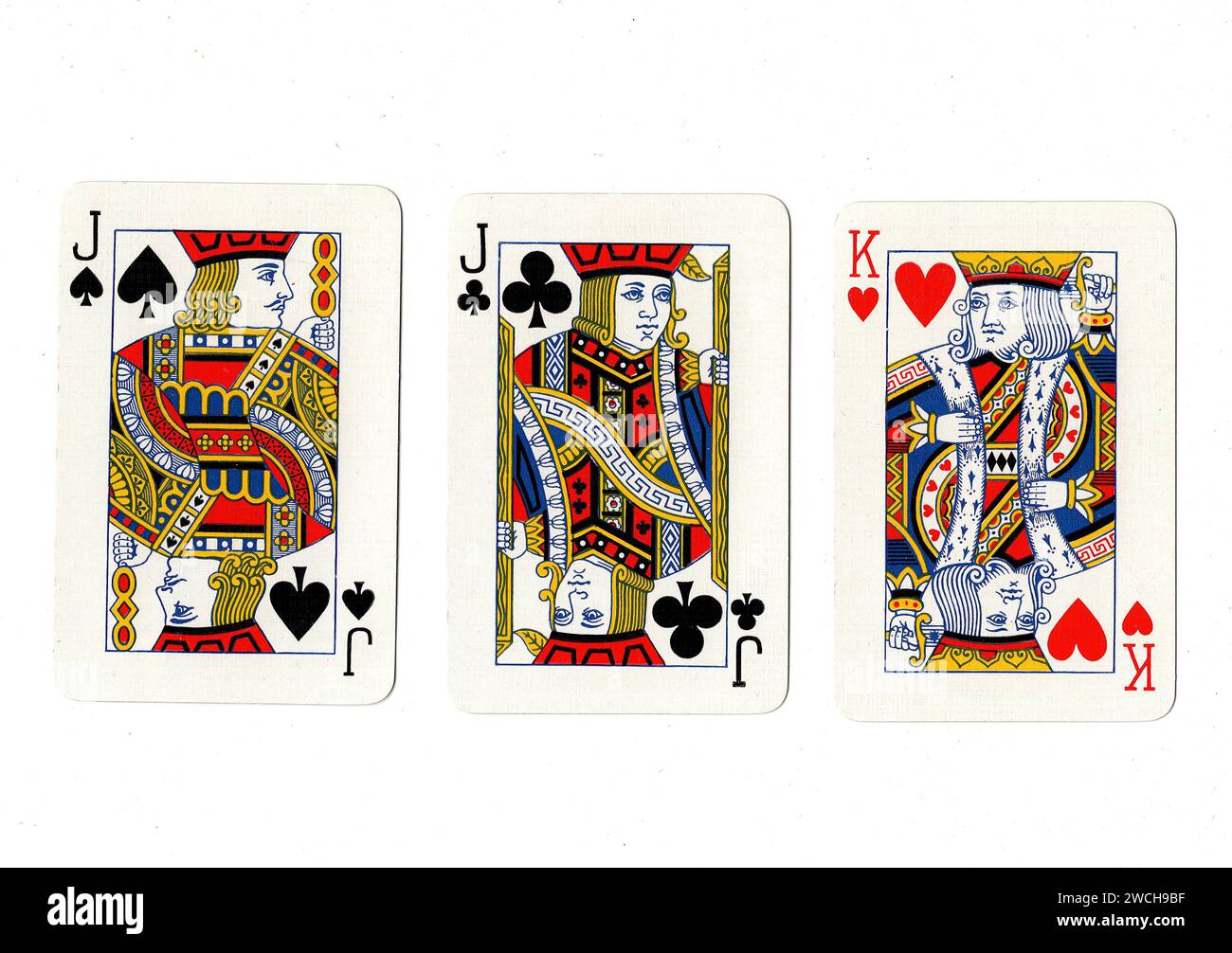 Vintage playing cards showing a pair of black jacks and a red king ...