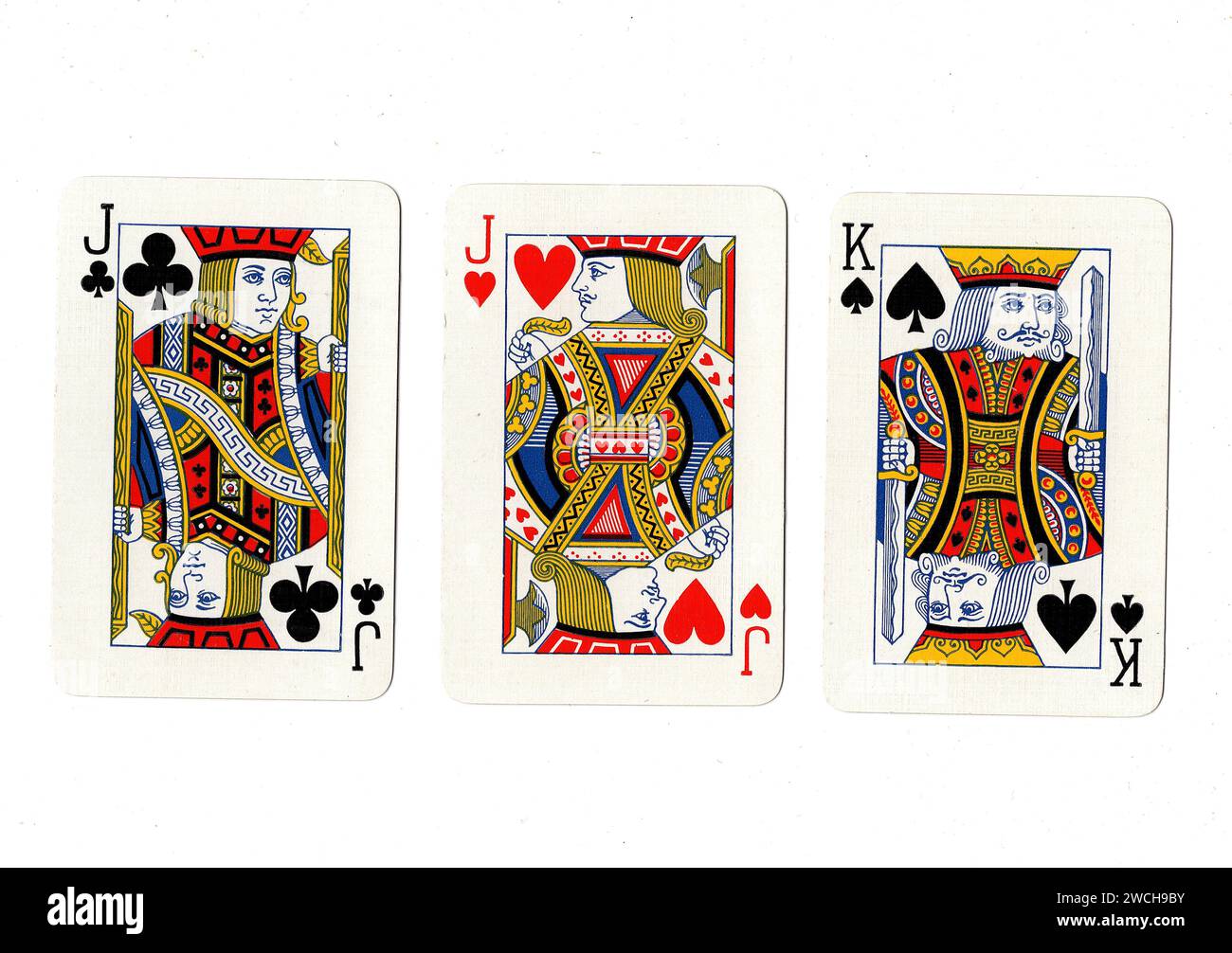 Vintage playing cards showing a pair of jacks and a king isolated on a ...
