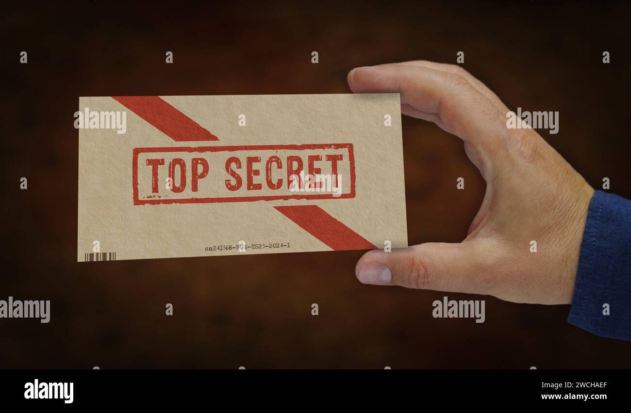 Top secret box in hand. Confidential documents cardboard pack factory ...