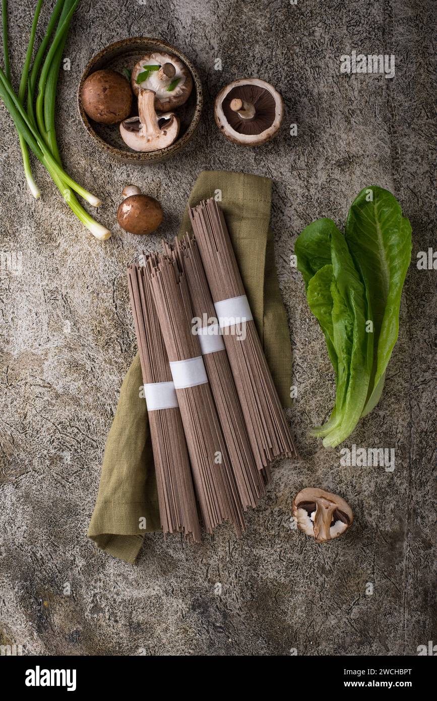 Raw soba noodles and cooking ingredient Stock Photo - Alamy