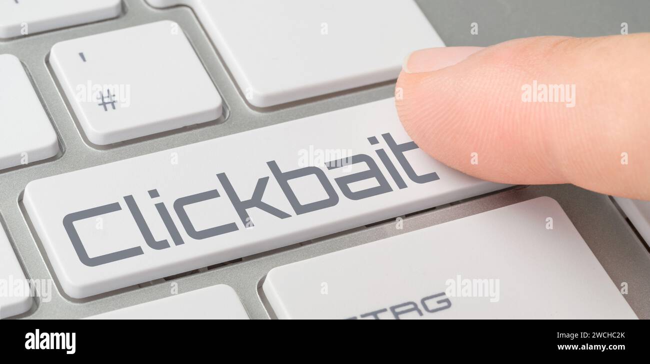 A keyboard with a labeled button - Clickbait Stock Photo - Alamy