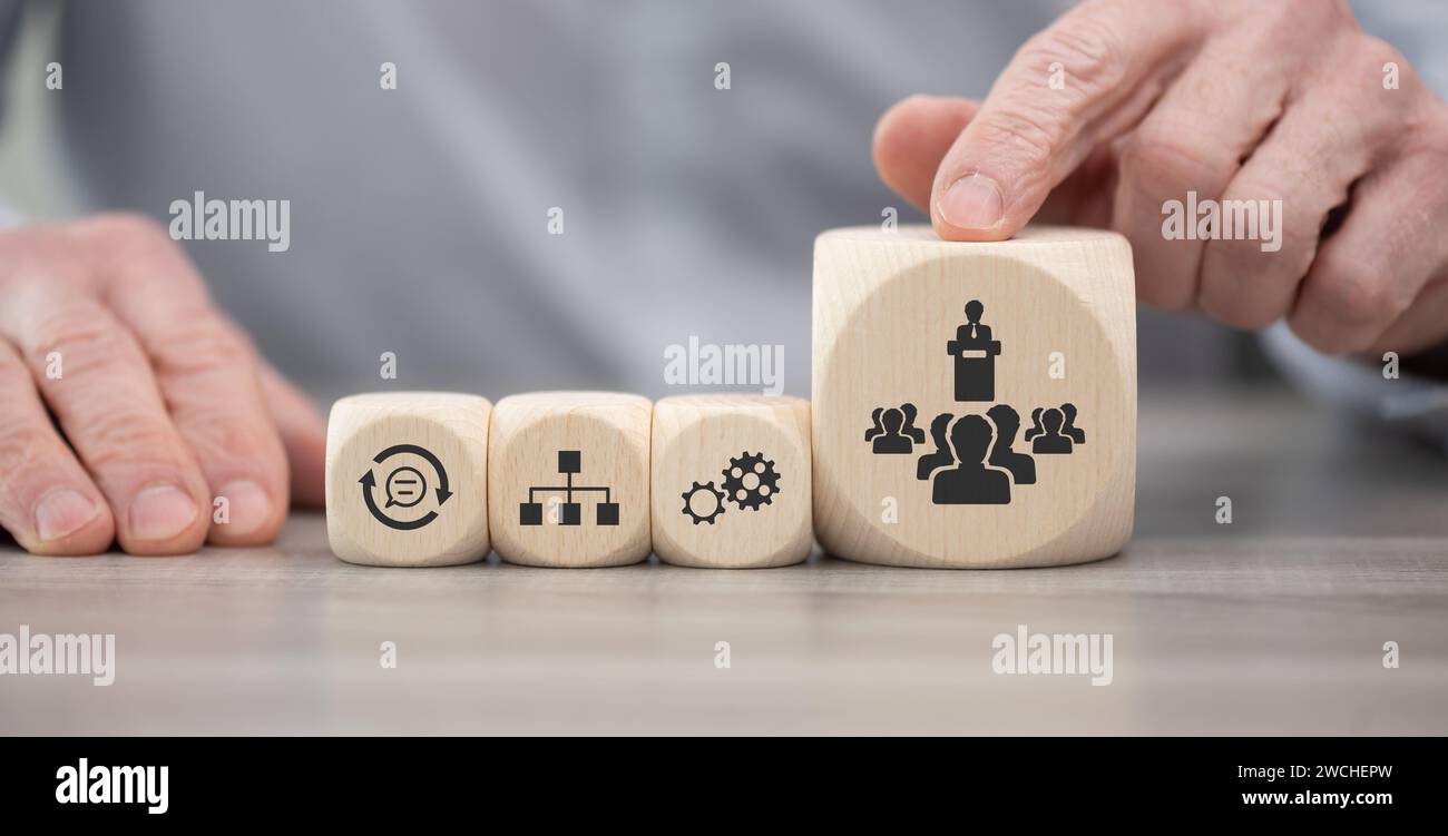 Wooden blocks with symbol of workshop concept Stock Photo - Alamy