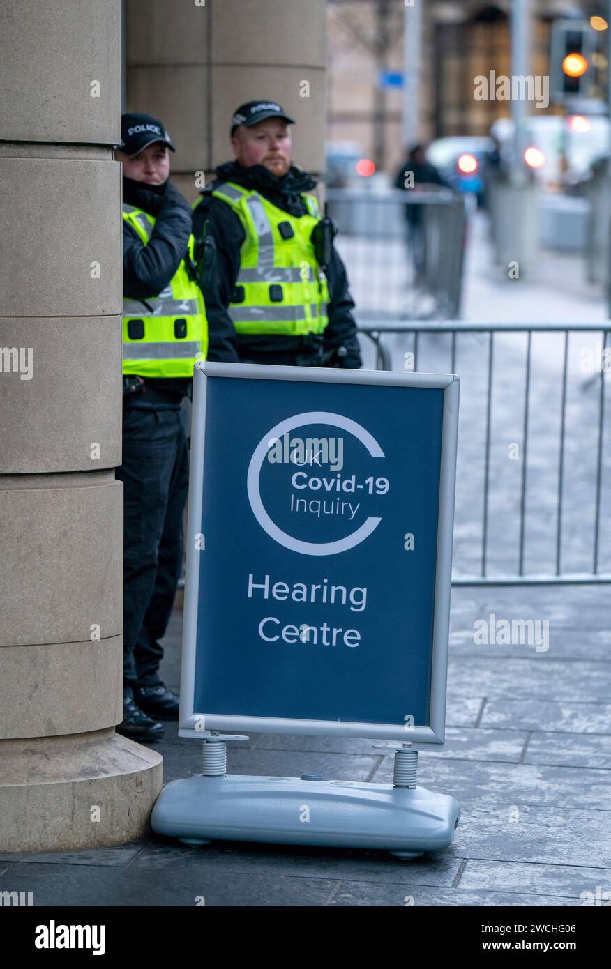 Police officers outside the main entrance to the UK Covid-19 Inquiry ...