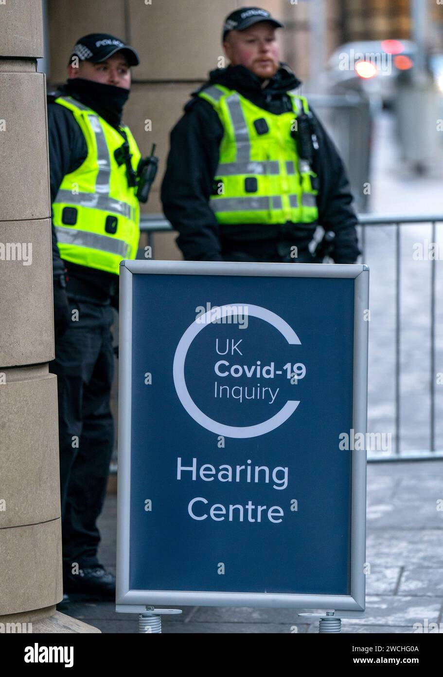Police officers outside the main entrance to the UK Covid-19 Inquiry ...
