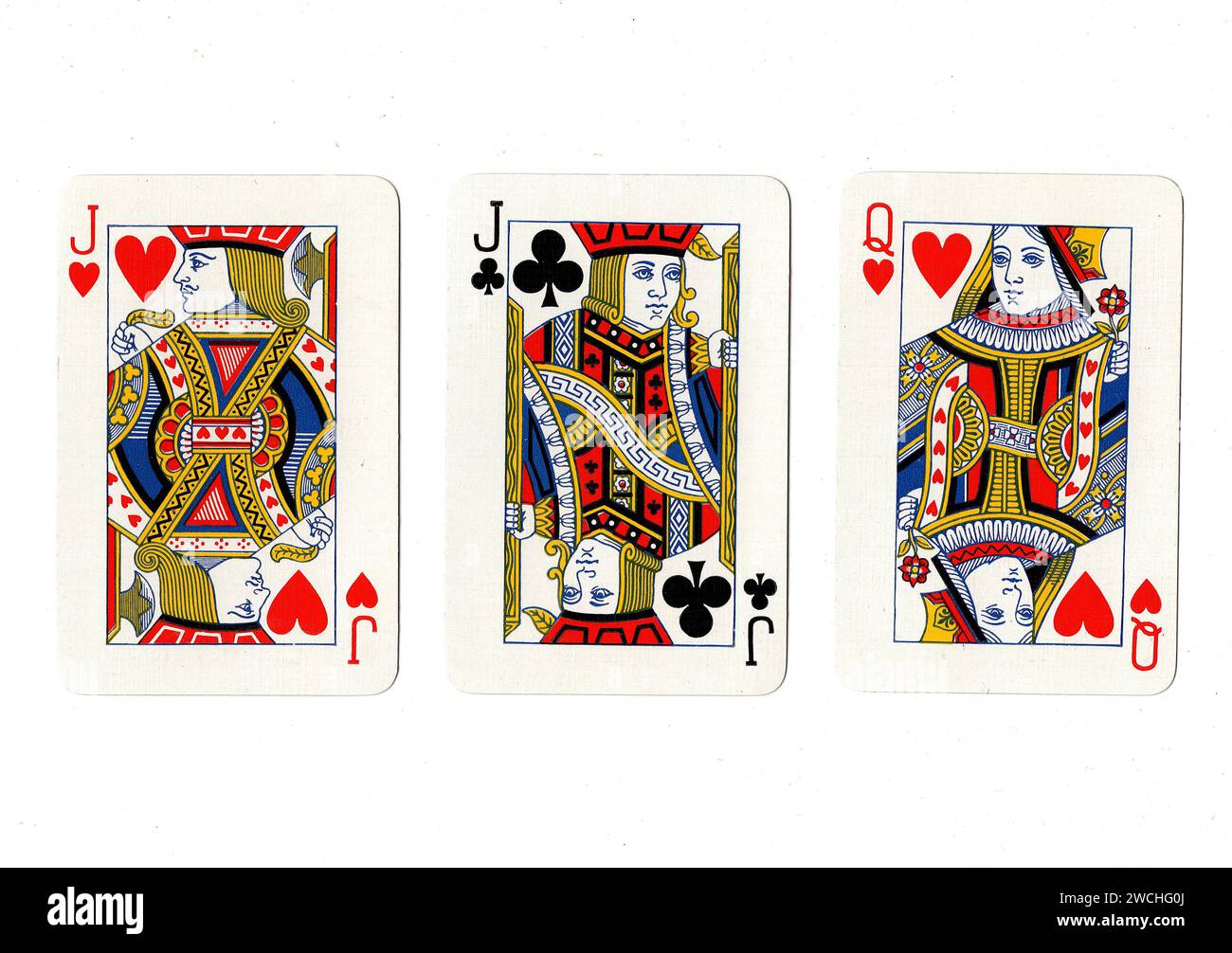 Vintage playing cards showing a pair of jacks and a queen isolated on a ...