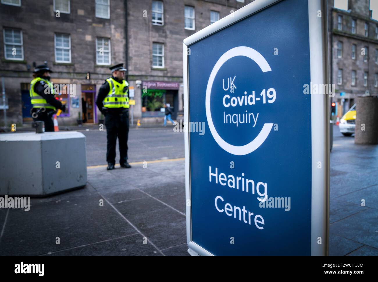 Police officers outside the main entrance to the UK Covid-19 Inquiry ...