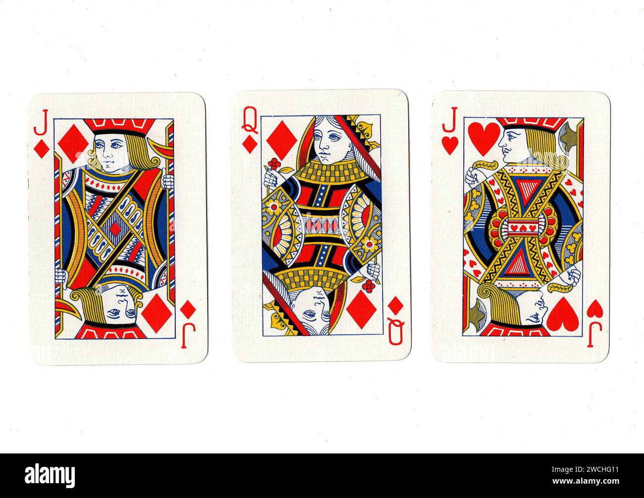 Vintage playing cards showing a pair of red jacks and a red queen ...