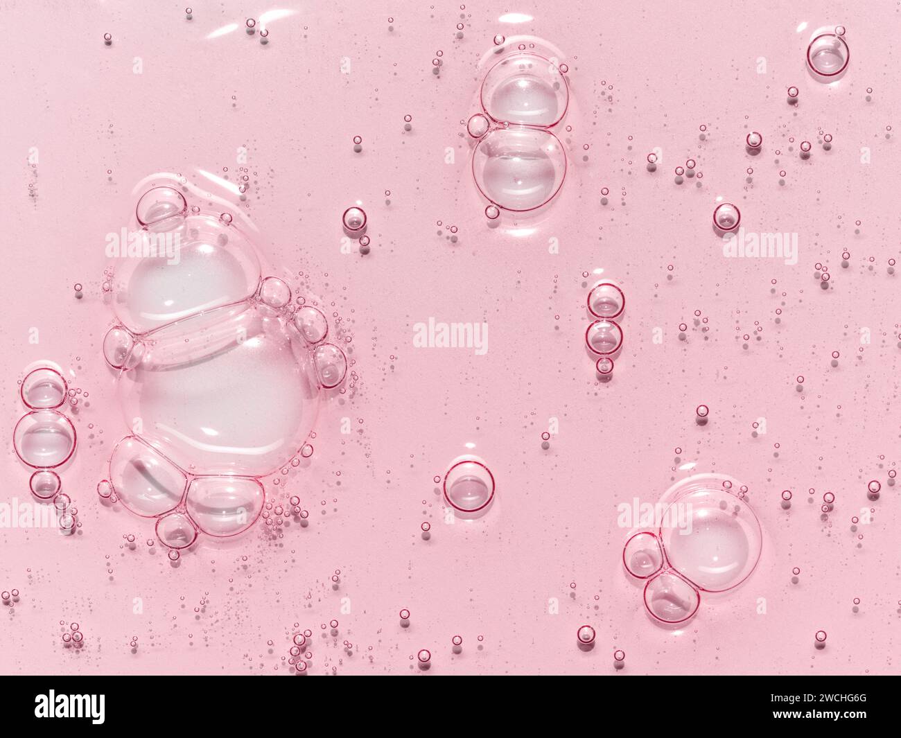 Pink serum oil sample swatch texture background. Cosmetic Hyaluronic ...