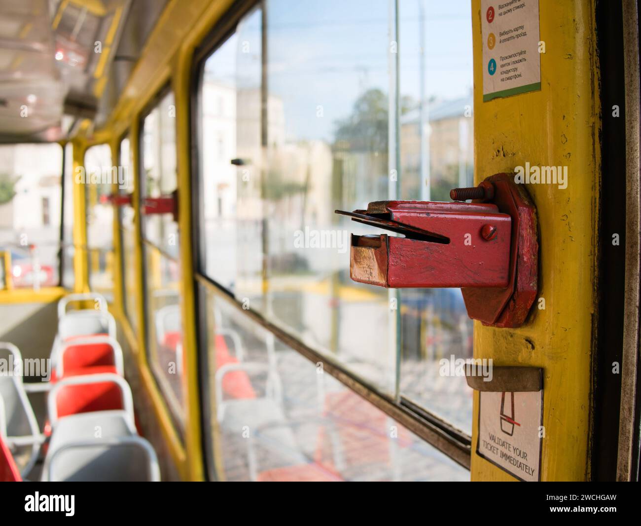 Old hole puncher (composter) for tram tickets in a tram car Stock Photo ...