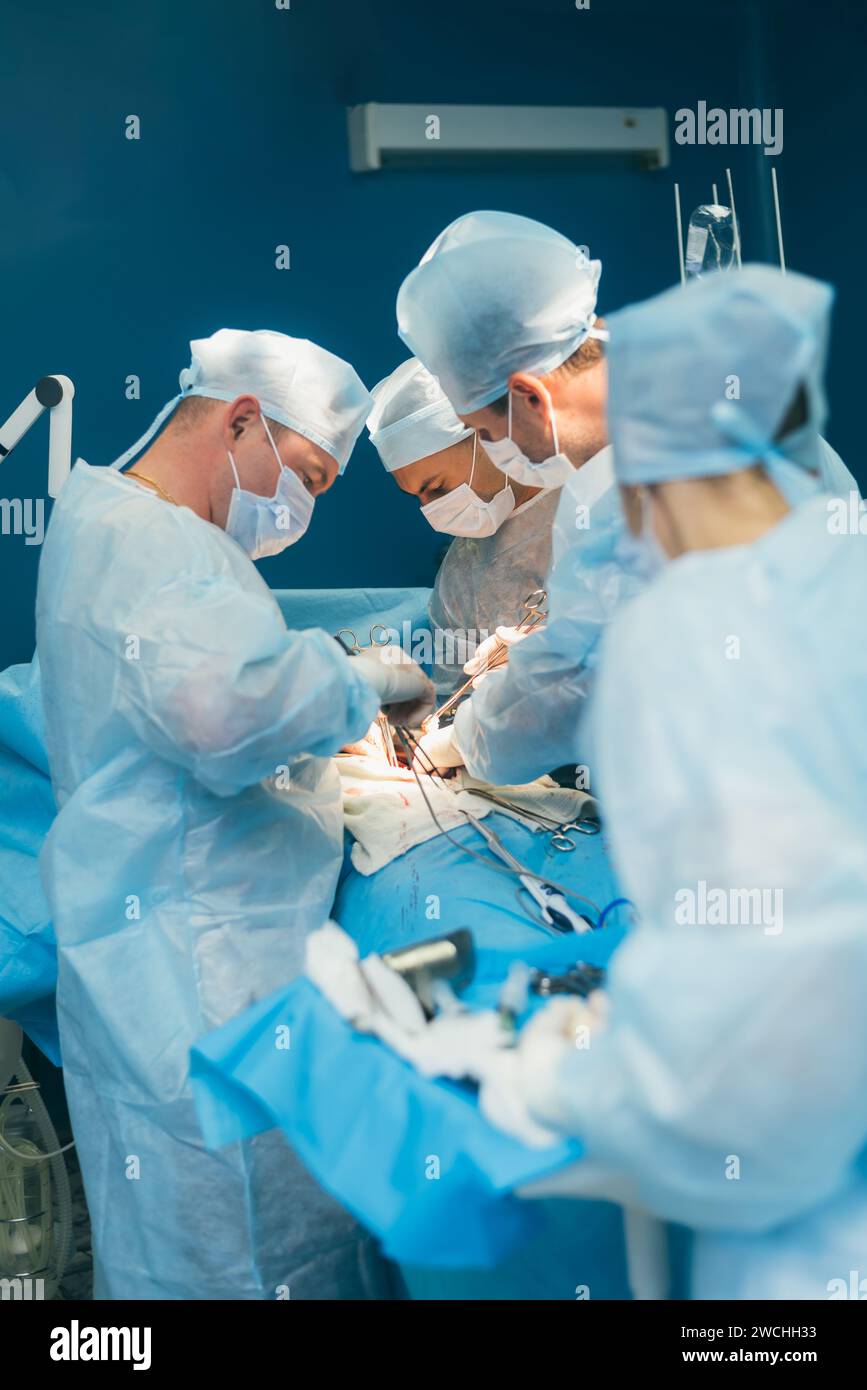 Surgical team doing operation patient hi-res stock photography and ...