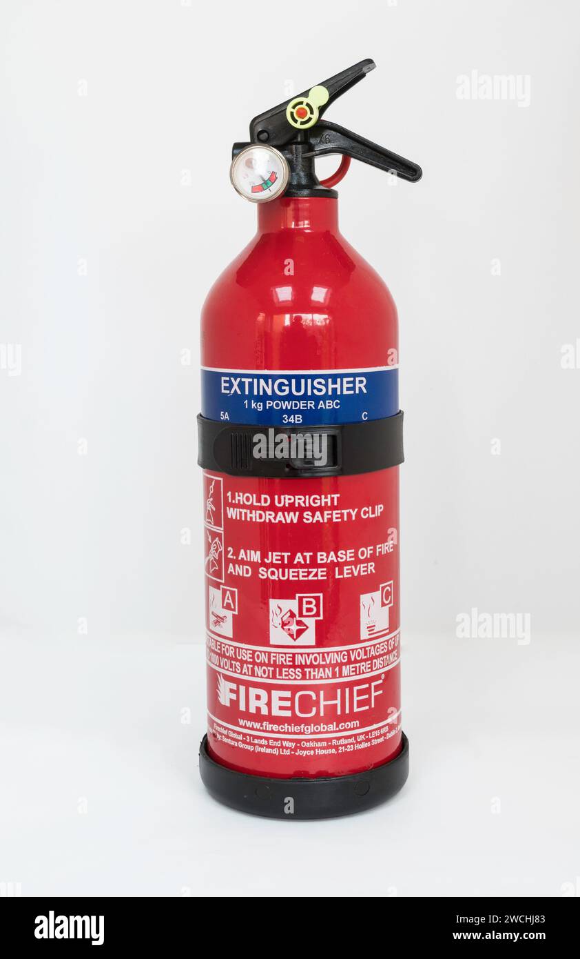A Firechief 1 kg powder fire extinguisher isolated on a white ...