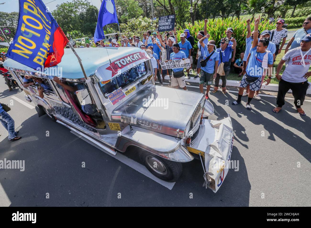 Quezon City, Philippines. 16th Jan, 2024. Jeepney drivers and activists ...