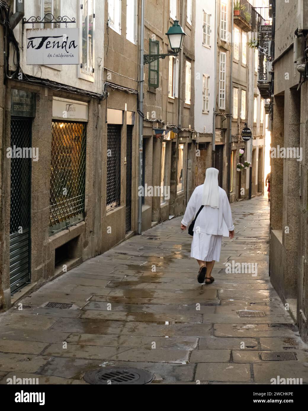 White garbs hi-res stock photography and images - Alamy