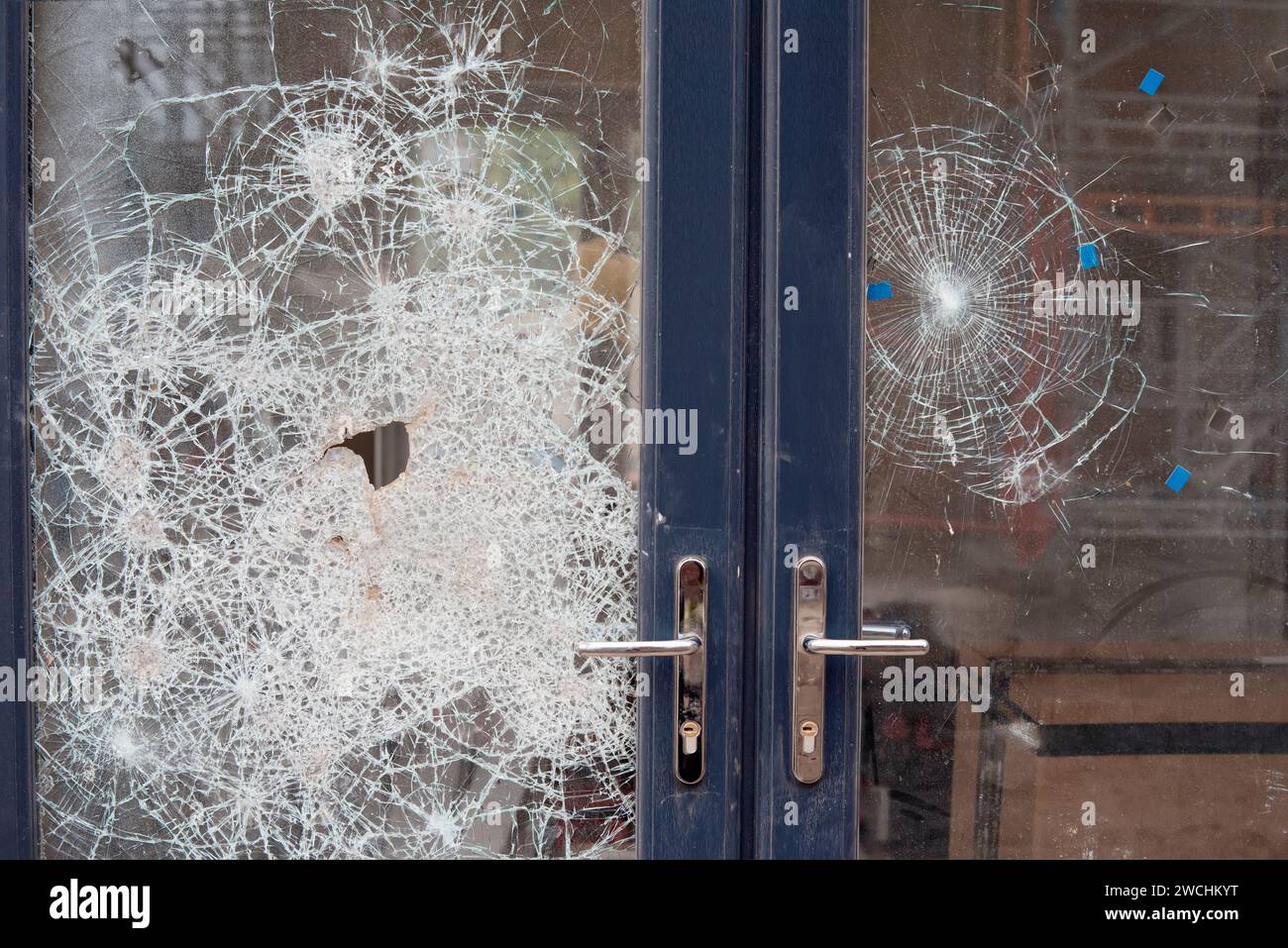 Broken window in new build house Stock Photo - Alamy