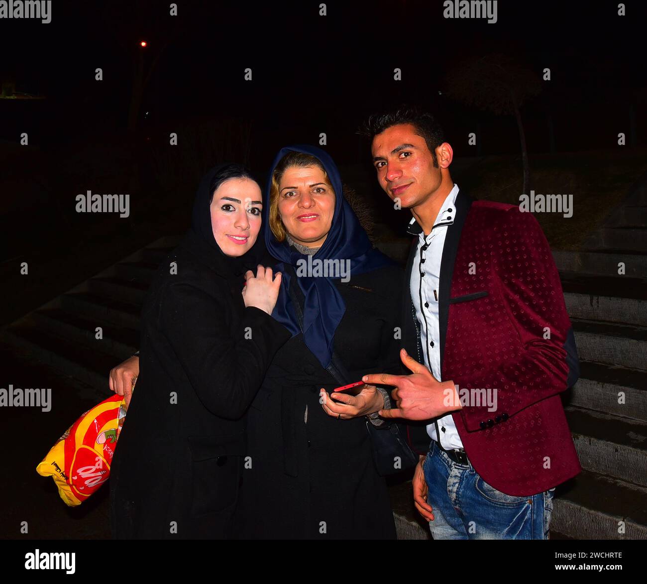 Friends and family hanging out by Si O Se Pol Bridge at night in ...